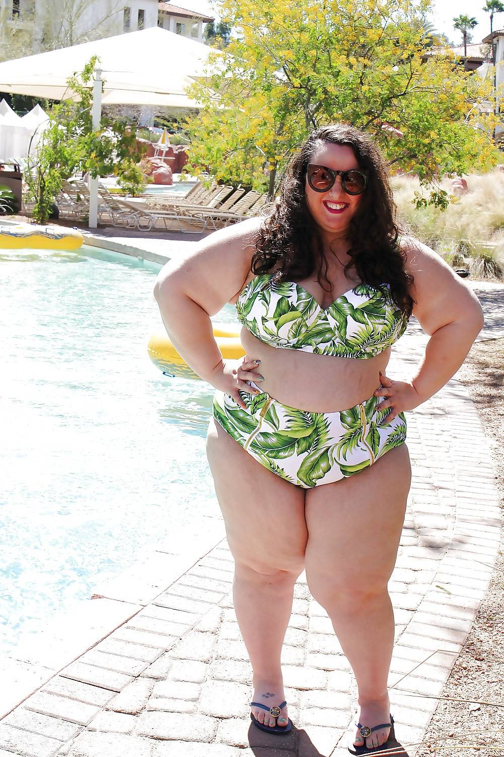 Confident BBW poses by the pool in her bikini | Scrolller
