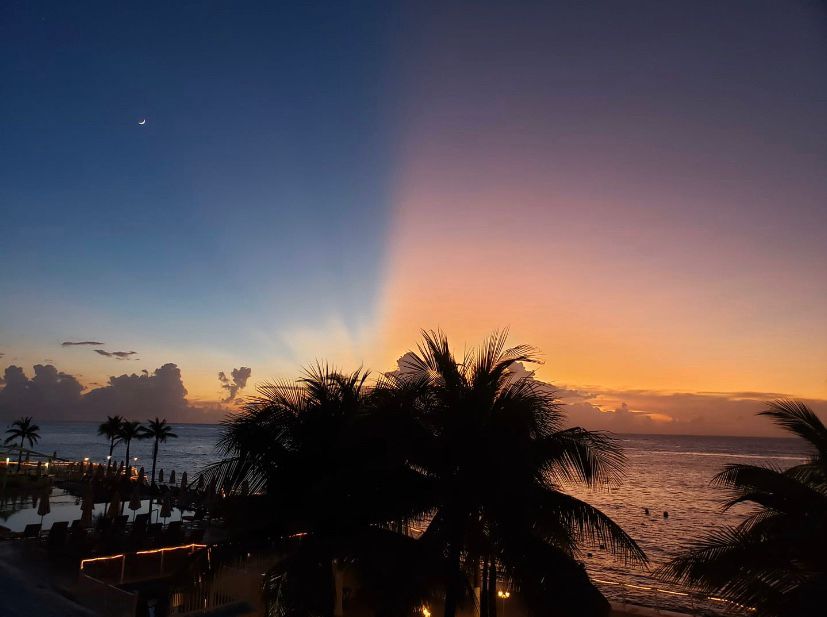 Cozumel Mexico sunset off balcony. | Scrolller