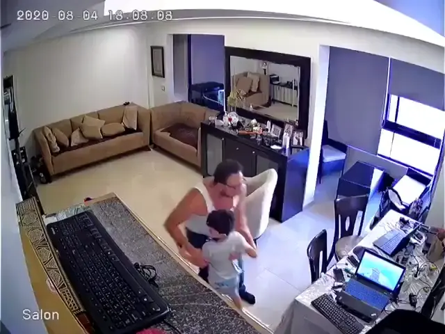 Dad protects his son after the Beirut explosion today | Scrolller