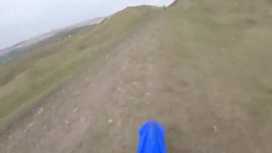 Dirt bike rider goes off cliff | Scrolller