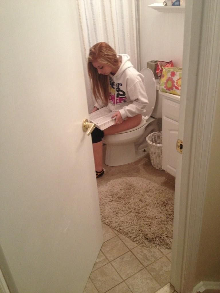 Doing her homework, perhaps? | Scrolller