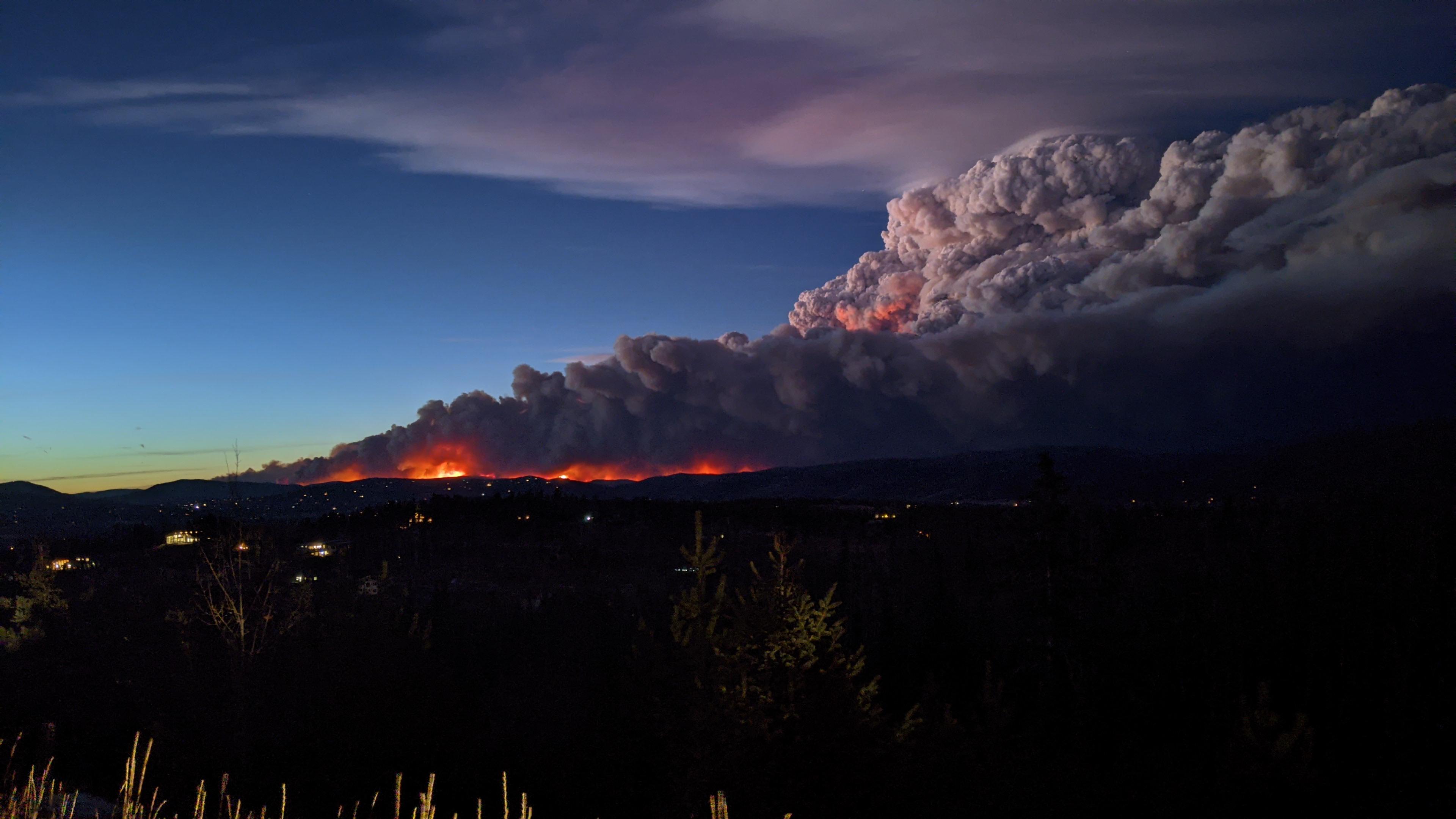 East Troublesome wildfire near sunset, seen from the Rendezvous neighborhood in Winter Park ...