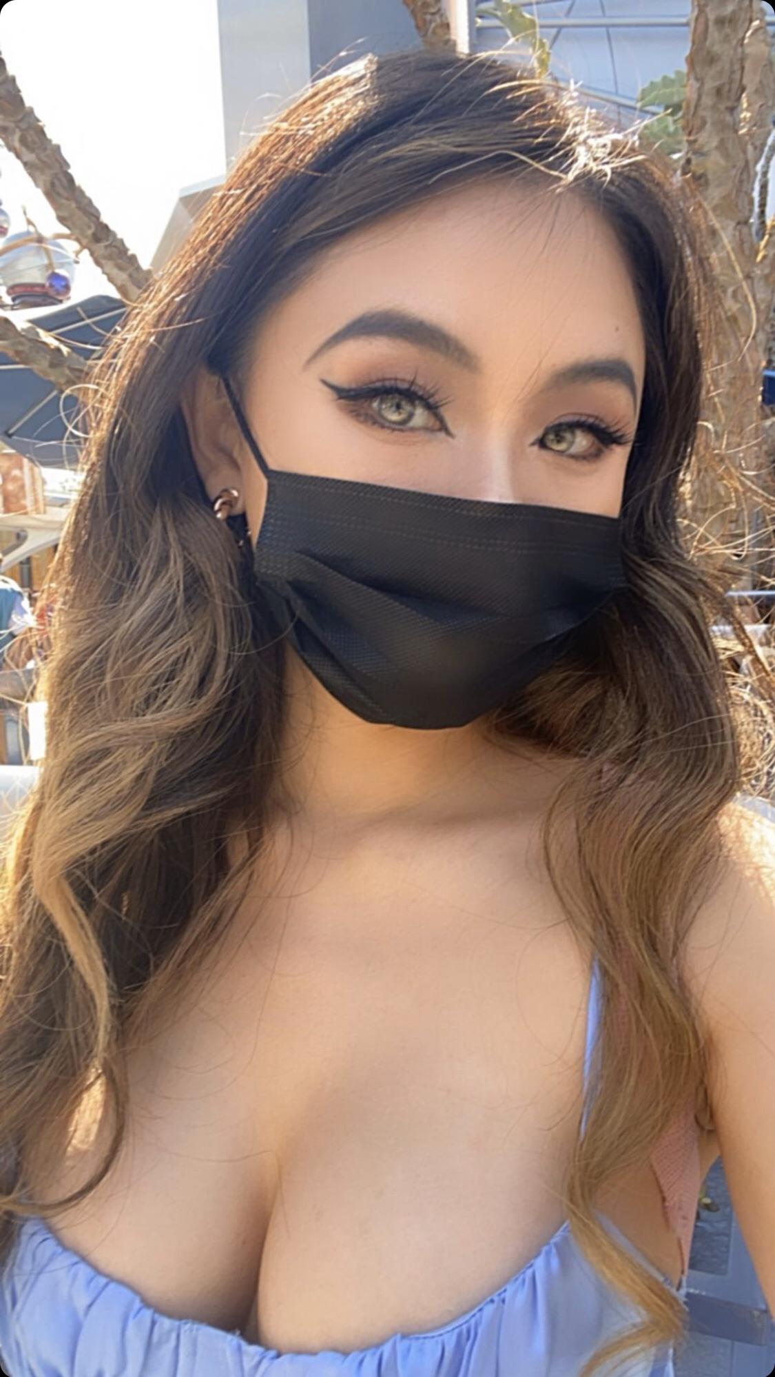 Face hidden. Cleavage well exposed | Scrolller