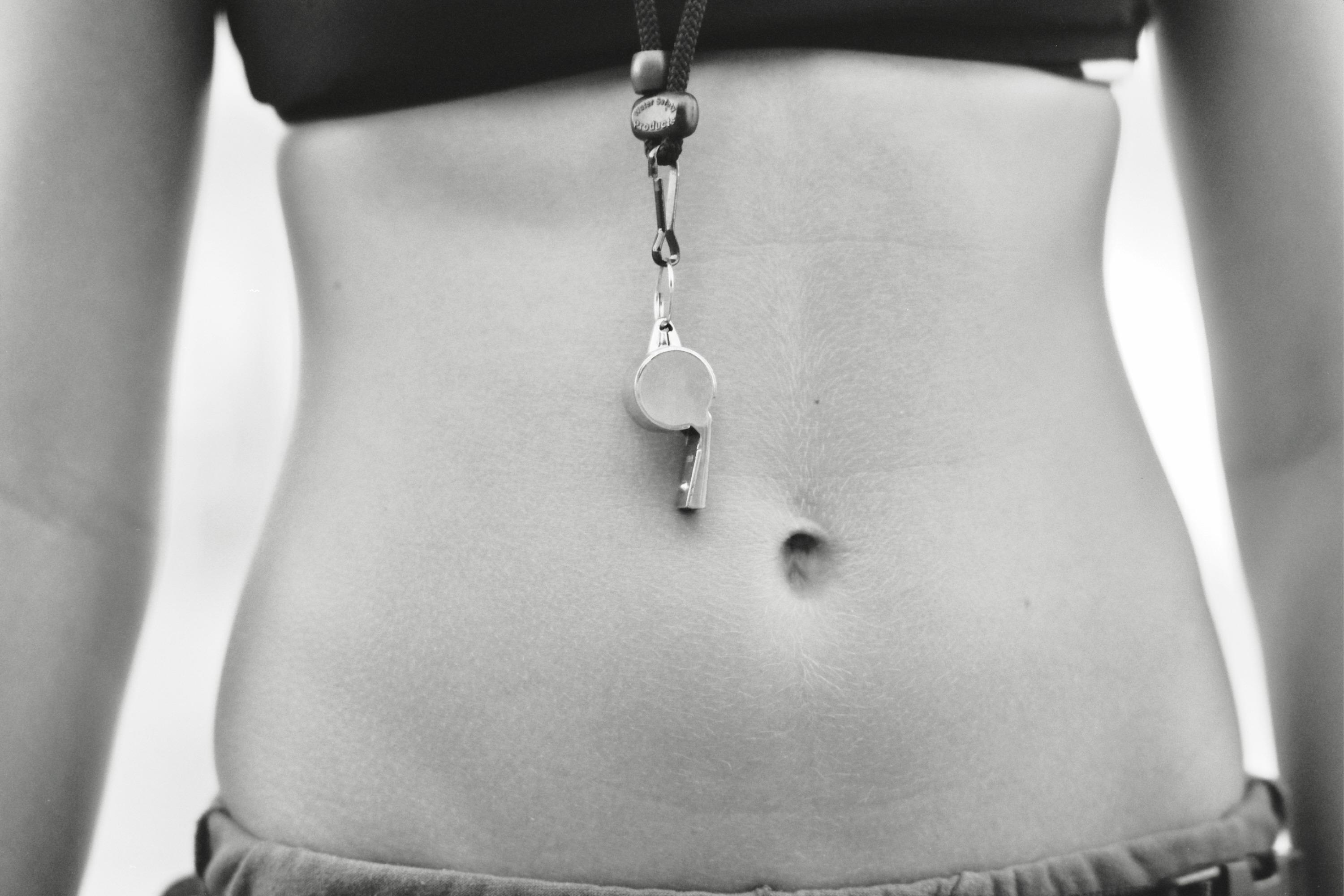 Female Lifeguard's Belly Button (Innie) | Scrolller