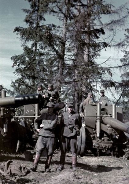 Finnish soldiers near captured Soviet howitzer ML-20 in Porlampi (Svetlichnoe near Vyborg ...