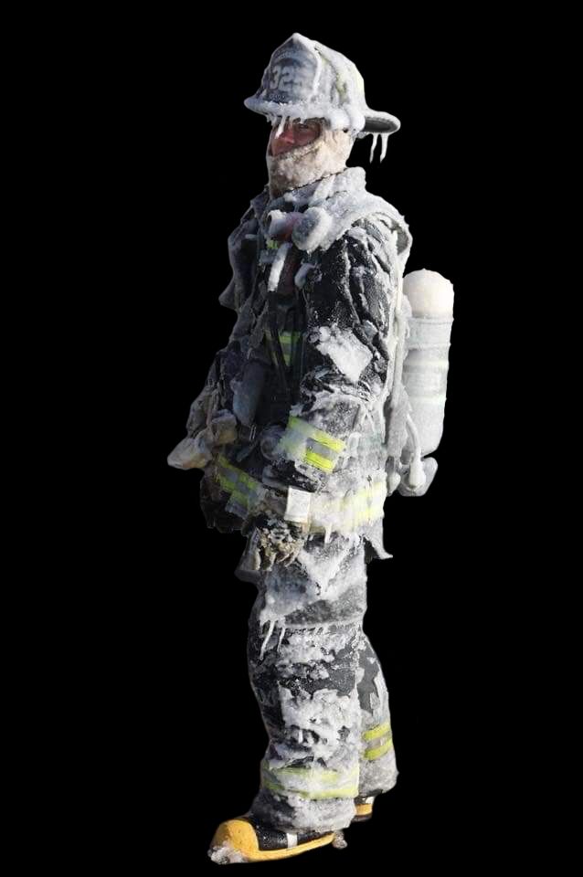 Firefighter covered in ice | Scrolller