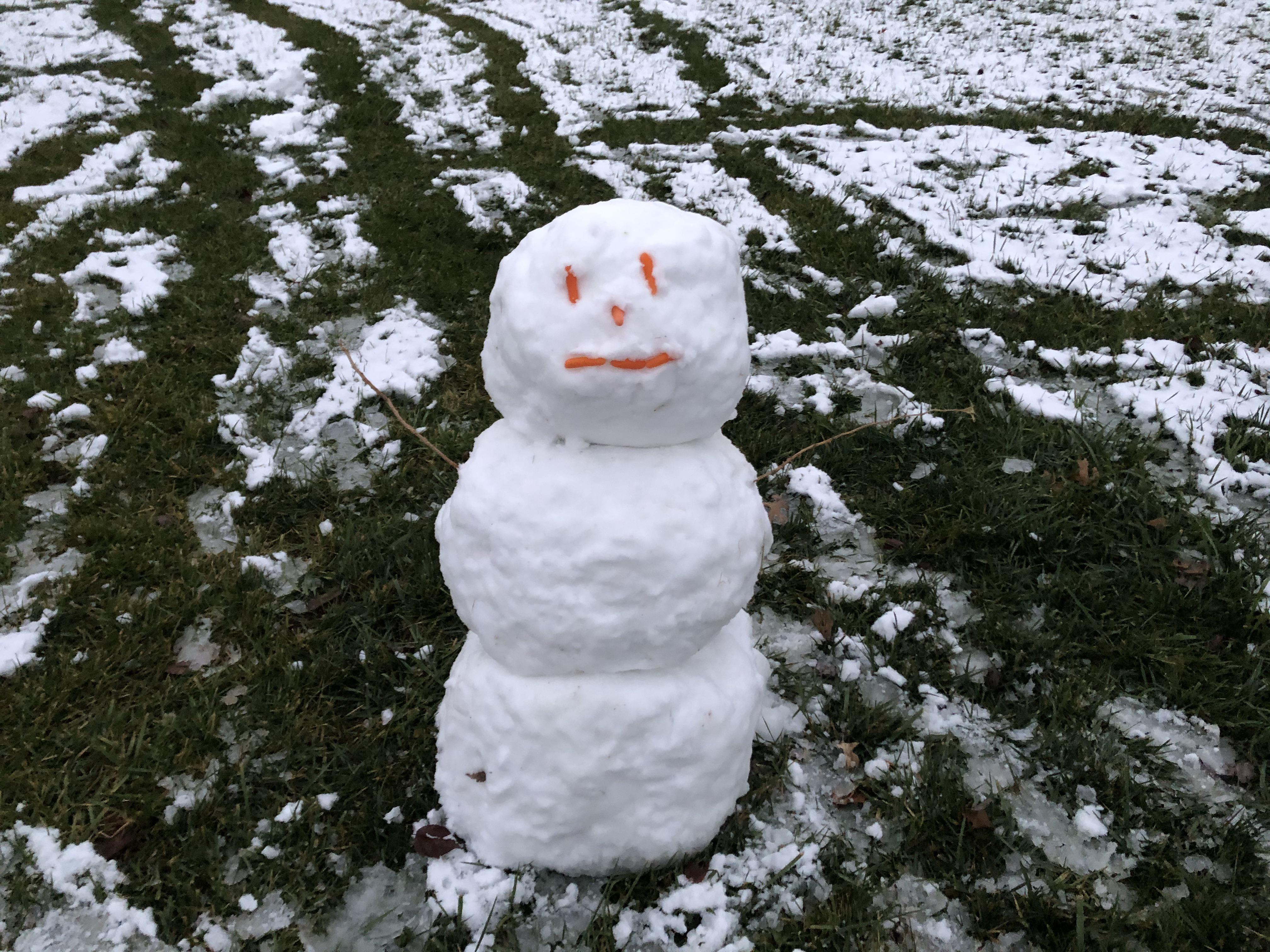 First time ever making a snowman! We dont get snow often in Tennessee but its fun when we do ...
