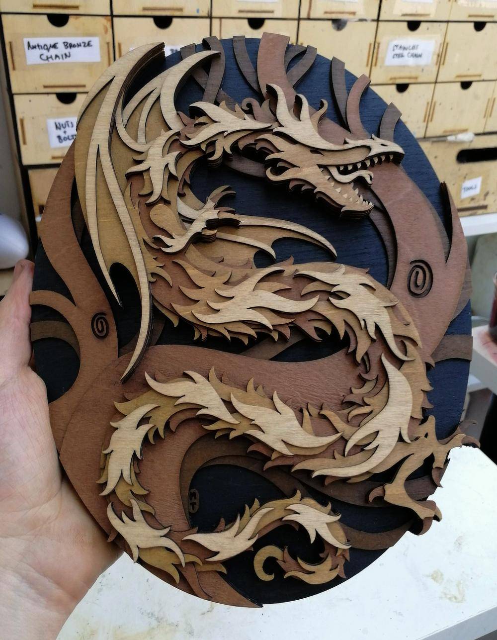 Forest Dragon I made from layers of laser cut wood | Scrolller