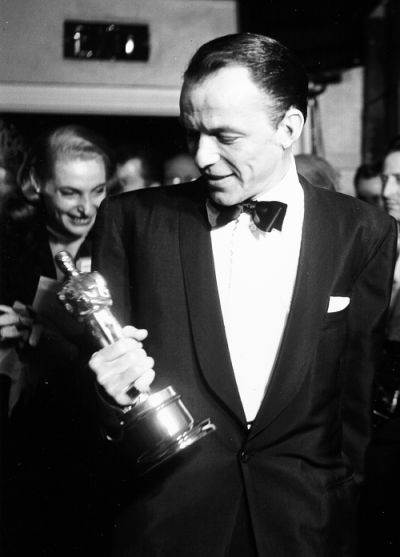 Frank Sinatra winning an Oscar for From Here to Eternity in 1954 | Scrolller