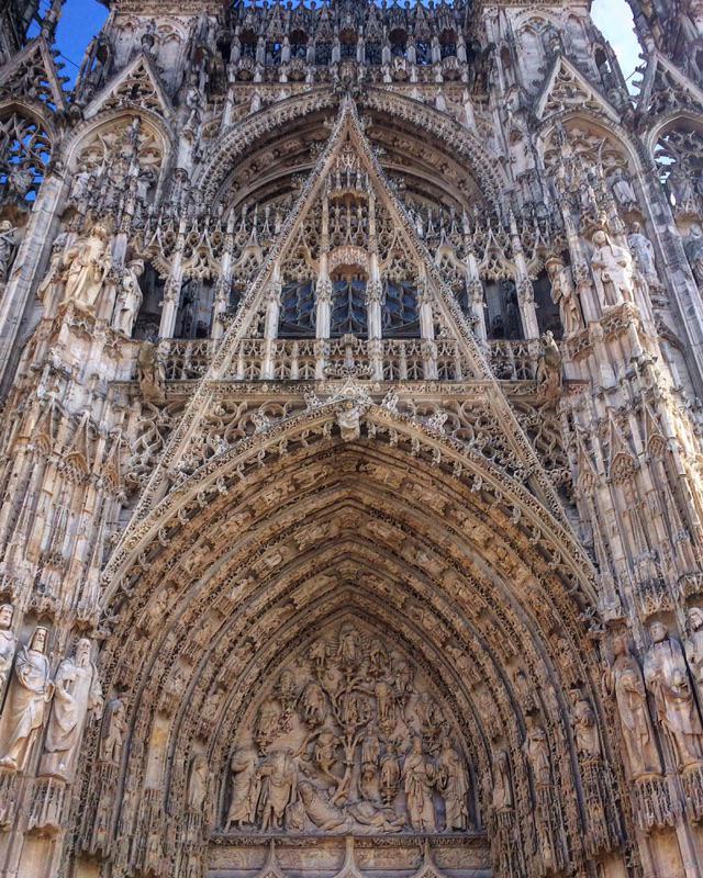 Front facade and tympanum of the Rouen Cathedral | Scrolller