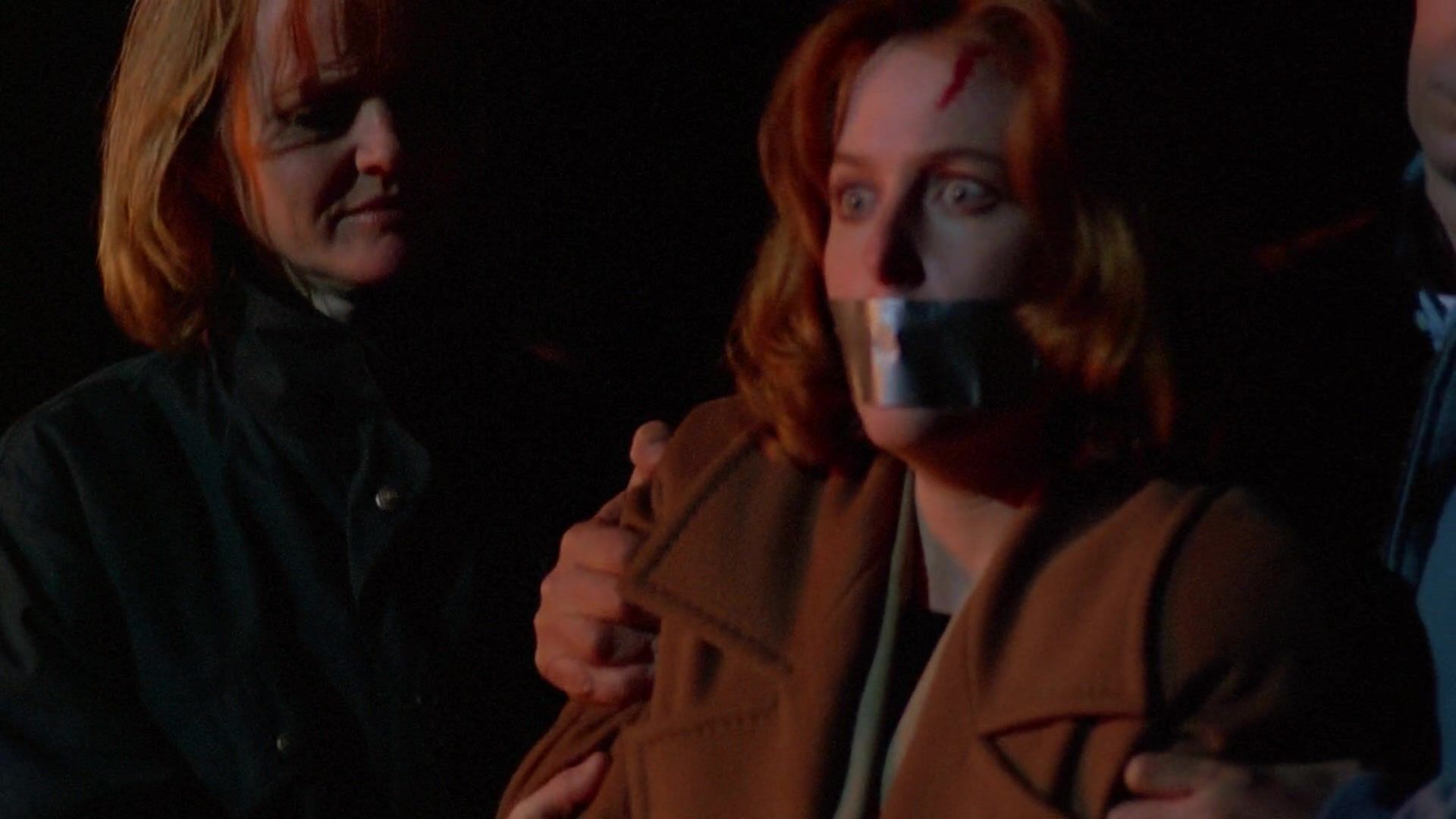 Gillian Anderson tightly gagged and dragged kicking and struggling towards her gang rape | Scrolller