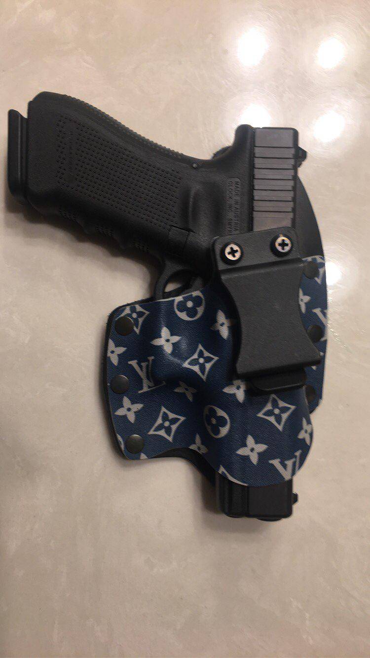Glock 17 Gen 4 in a Louis Vuitton styled holster for lawful concealed carry. | Scrolller