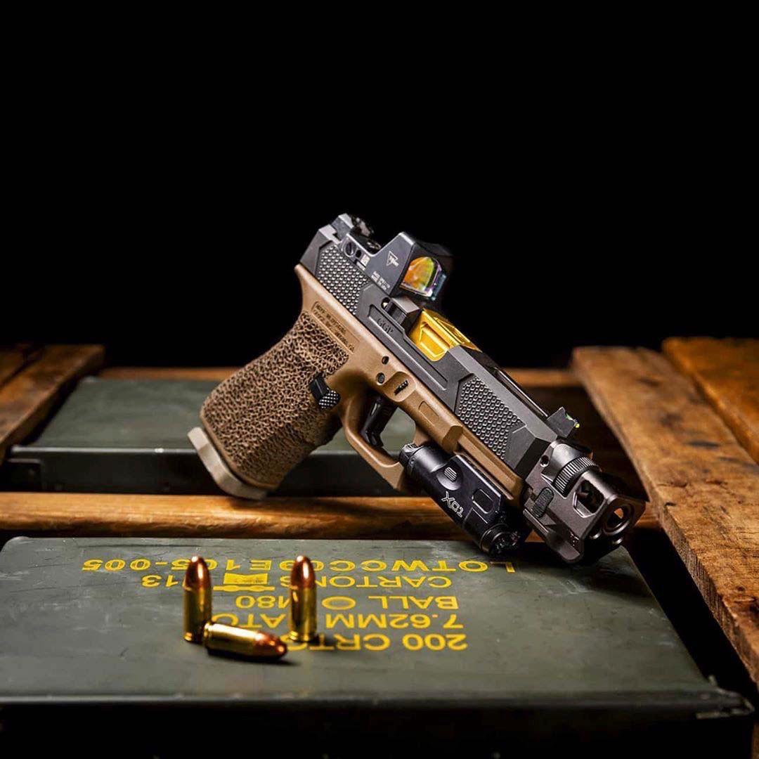 Glock 19 with velocity comp. | Scrolller