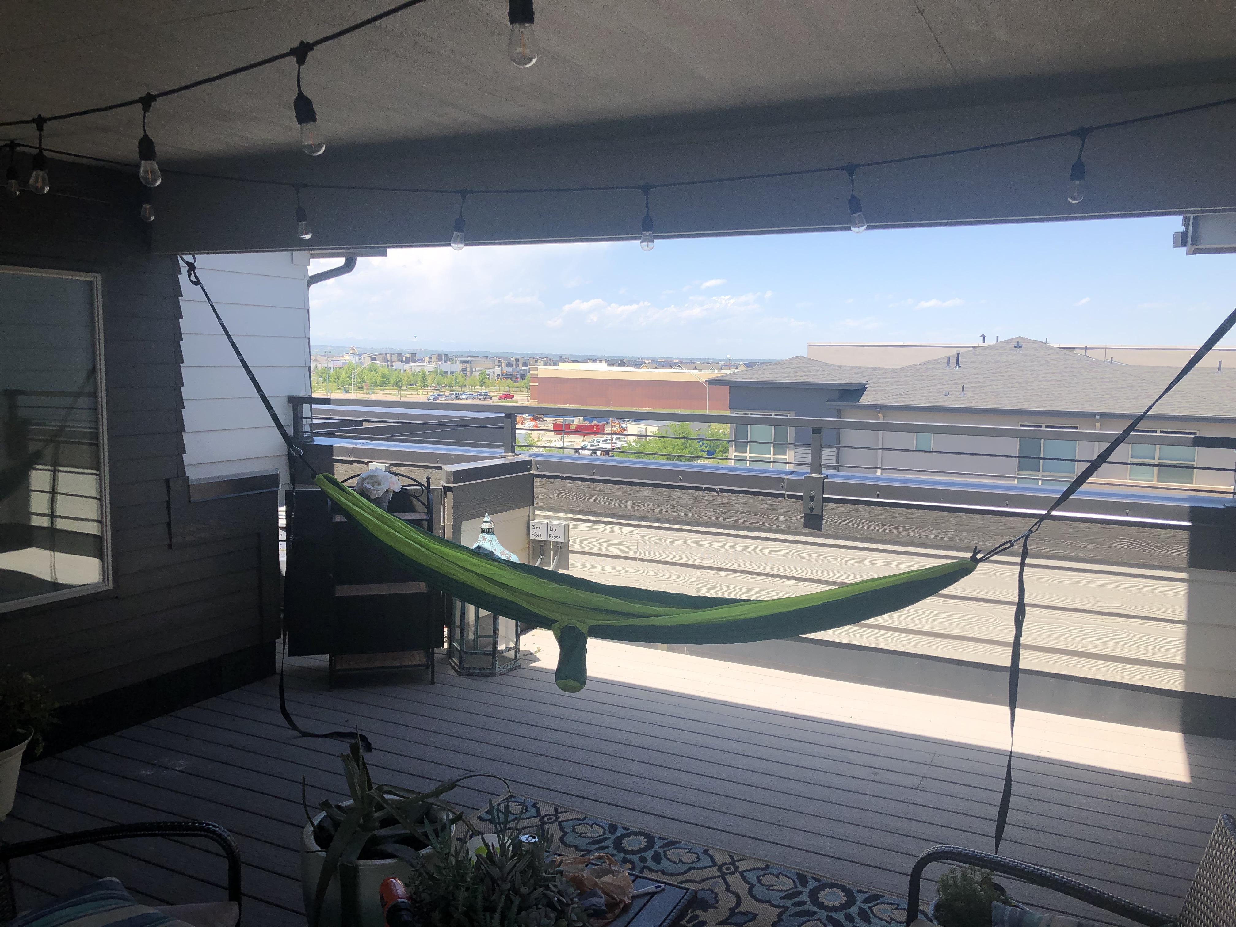 Had a nice beam and some D rings and made a nice hanging spot for our rooftop patio | Scrolller