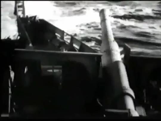 Hans Butterfinger misses the shell casing on an M-class minesweeper in the English Channel in ...