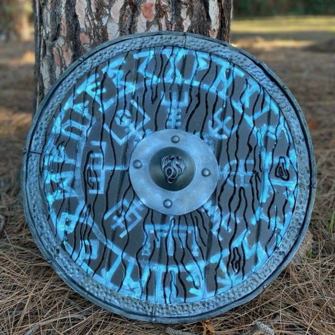 Here is a glow in the dark runic shield I made for fun! Thought you all might like it! | Scrolller