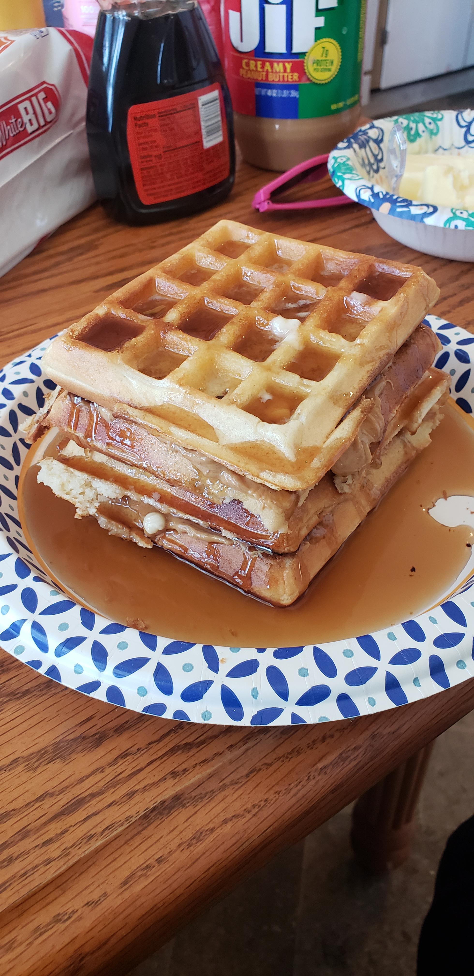 Homemade Belgium waffles with butter and peanut butter for Father's Day. | Scrolller