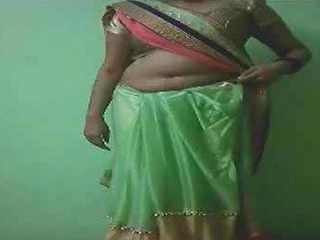 Hot Aunty strips Saree and showing her Sexy body | Scrolller