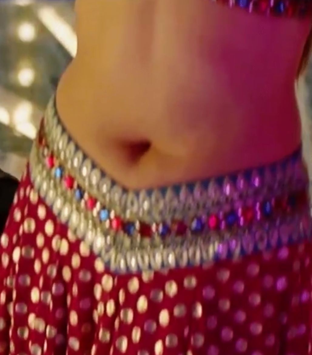 How deep do you think her navel is? | Scrolller