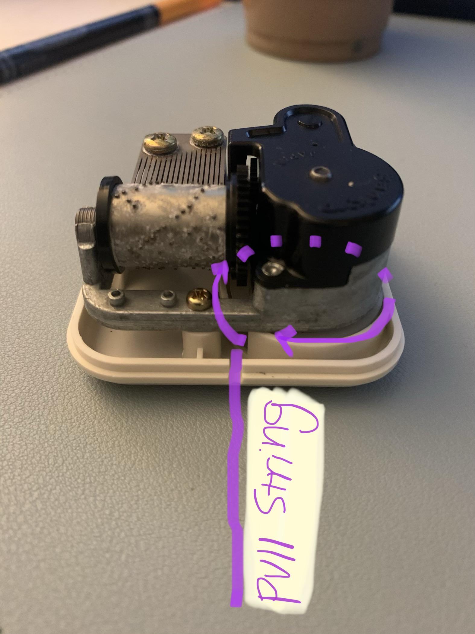 How to fix a pull string music box? | Scrolller