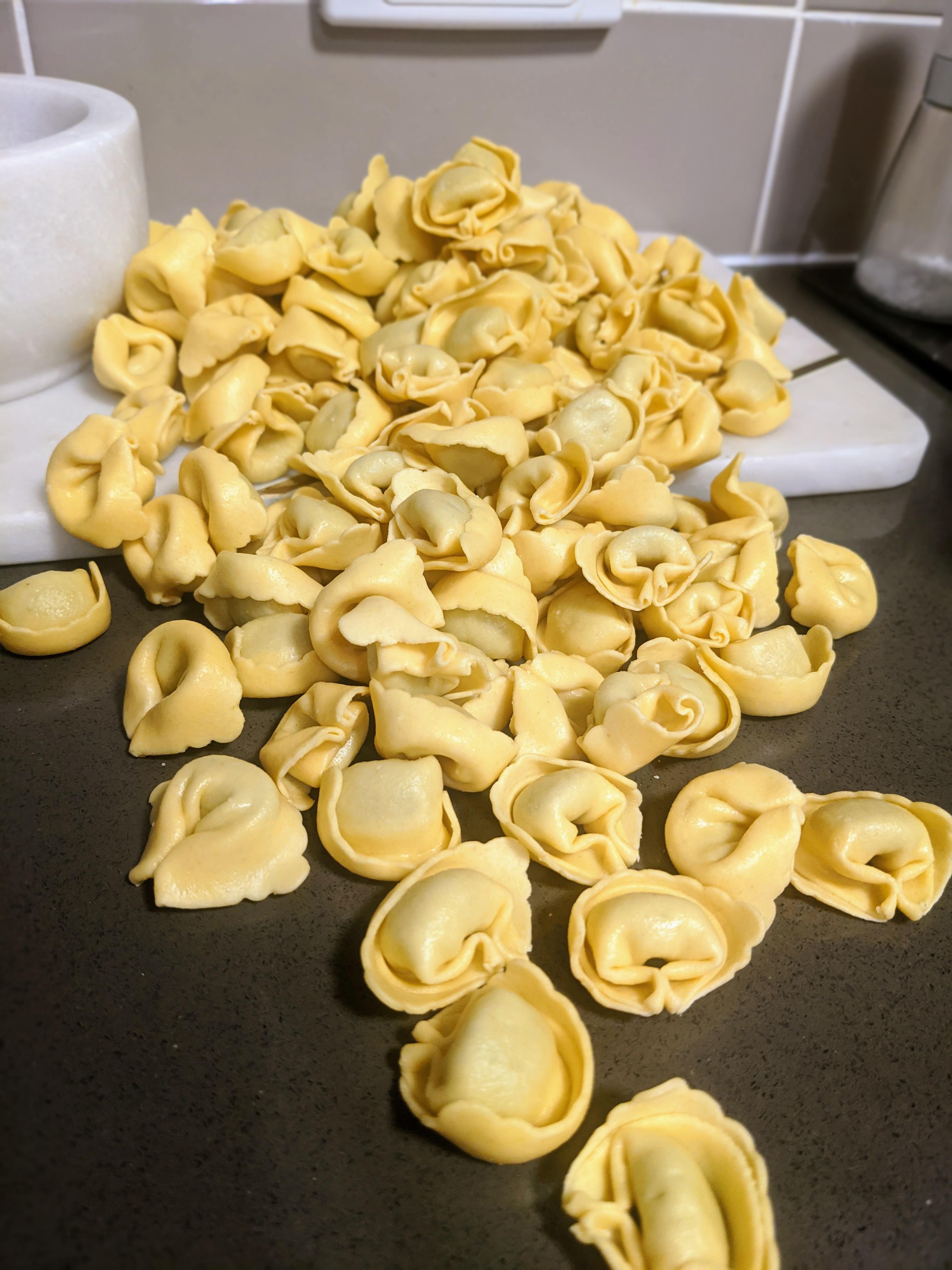 I enjoy making pasta from scratch. Here is my attempt at spinach and ricotta tortellini. | Scrolller