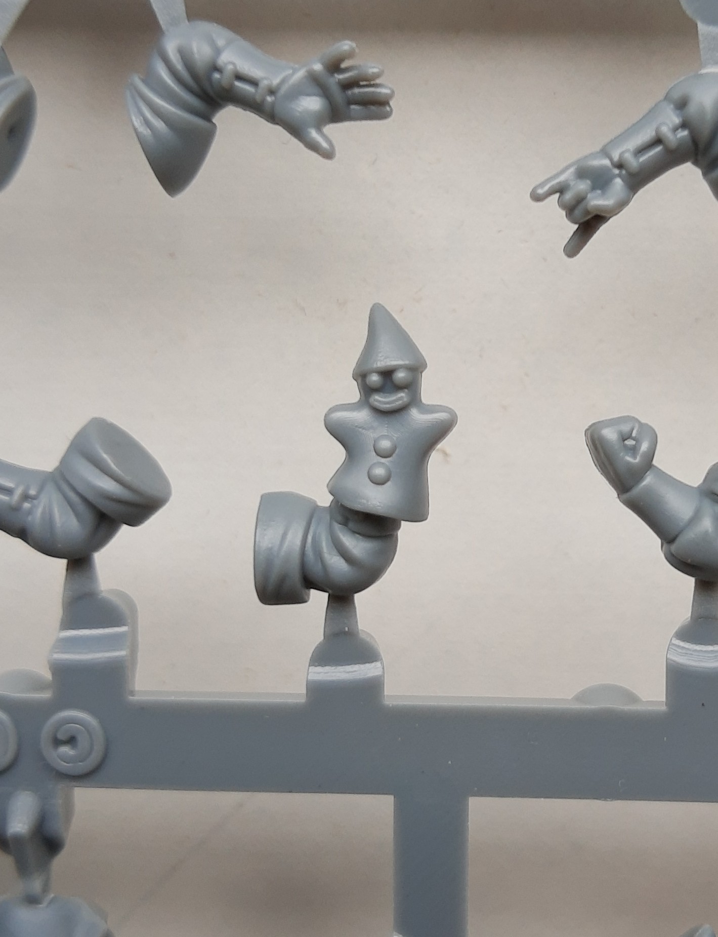 I just discovered a hand puppet on a sprue I had randomly ordered. Made me giggle. | Scrolller