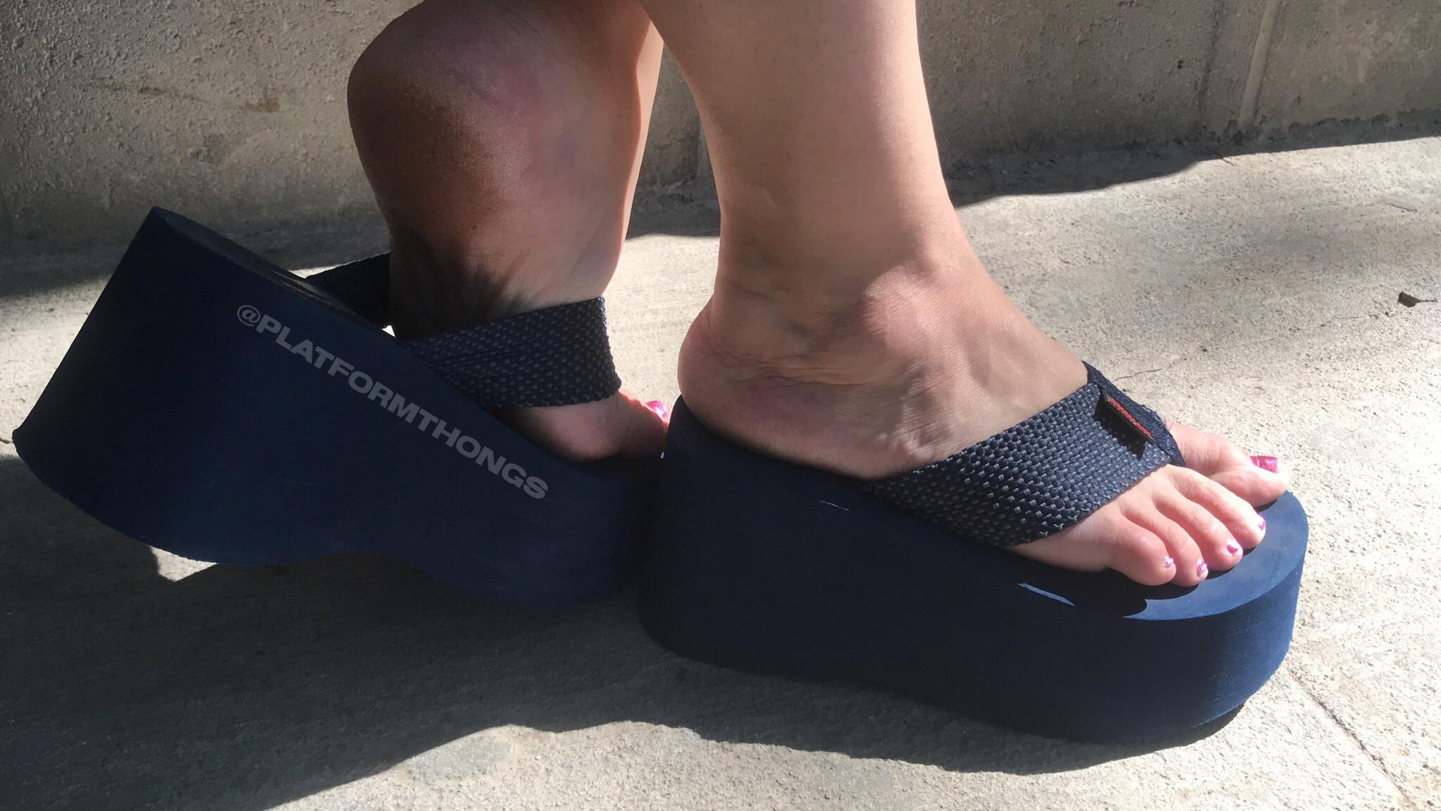 I just love the shape of her feet in rocketdog platform flip flops. So chunky! What do you think ...