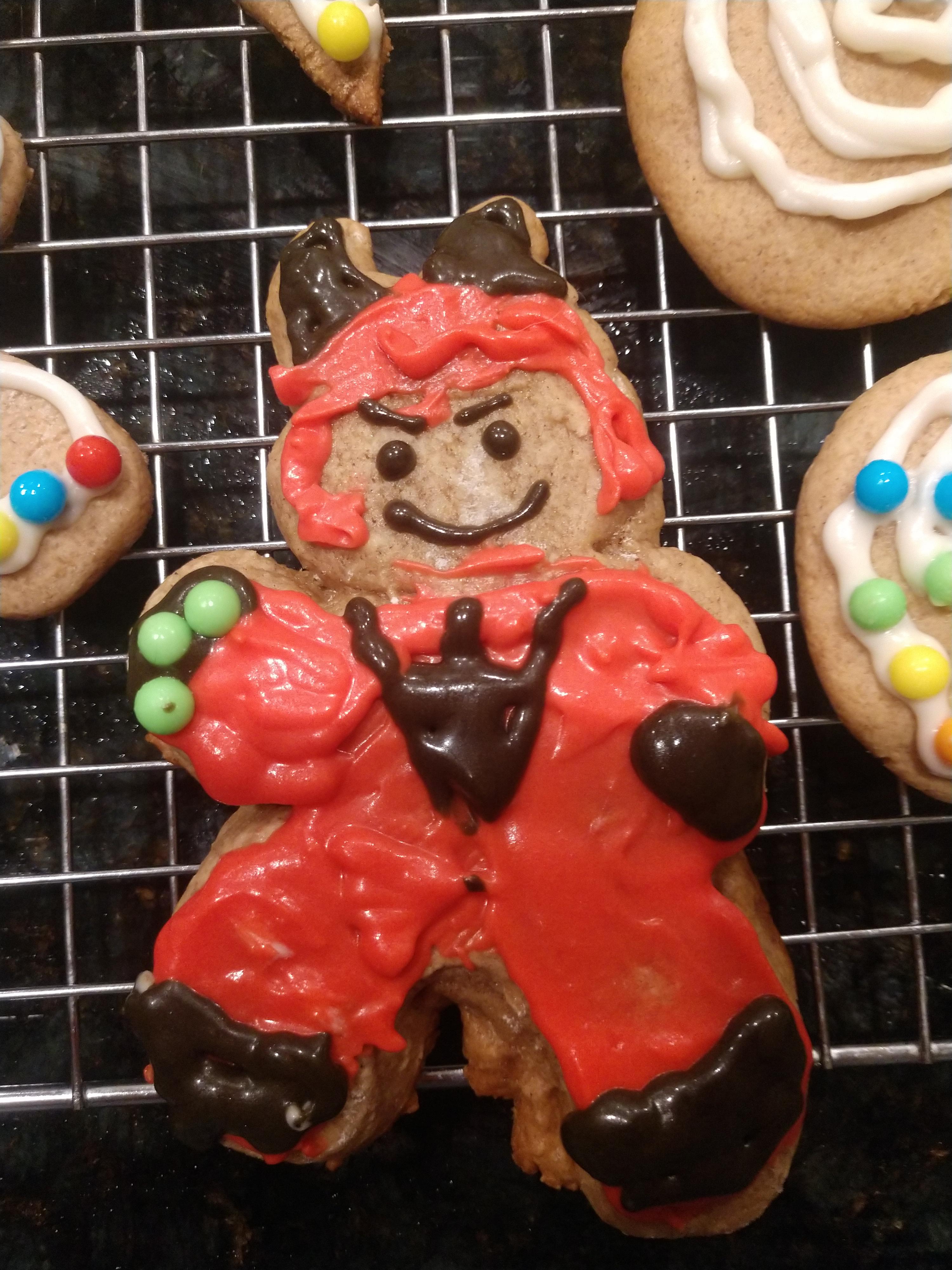 I made an Alastor gingerbread cookies! (Excuse my sub par icing skills ...