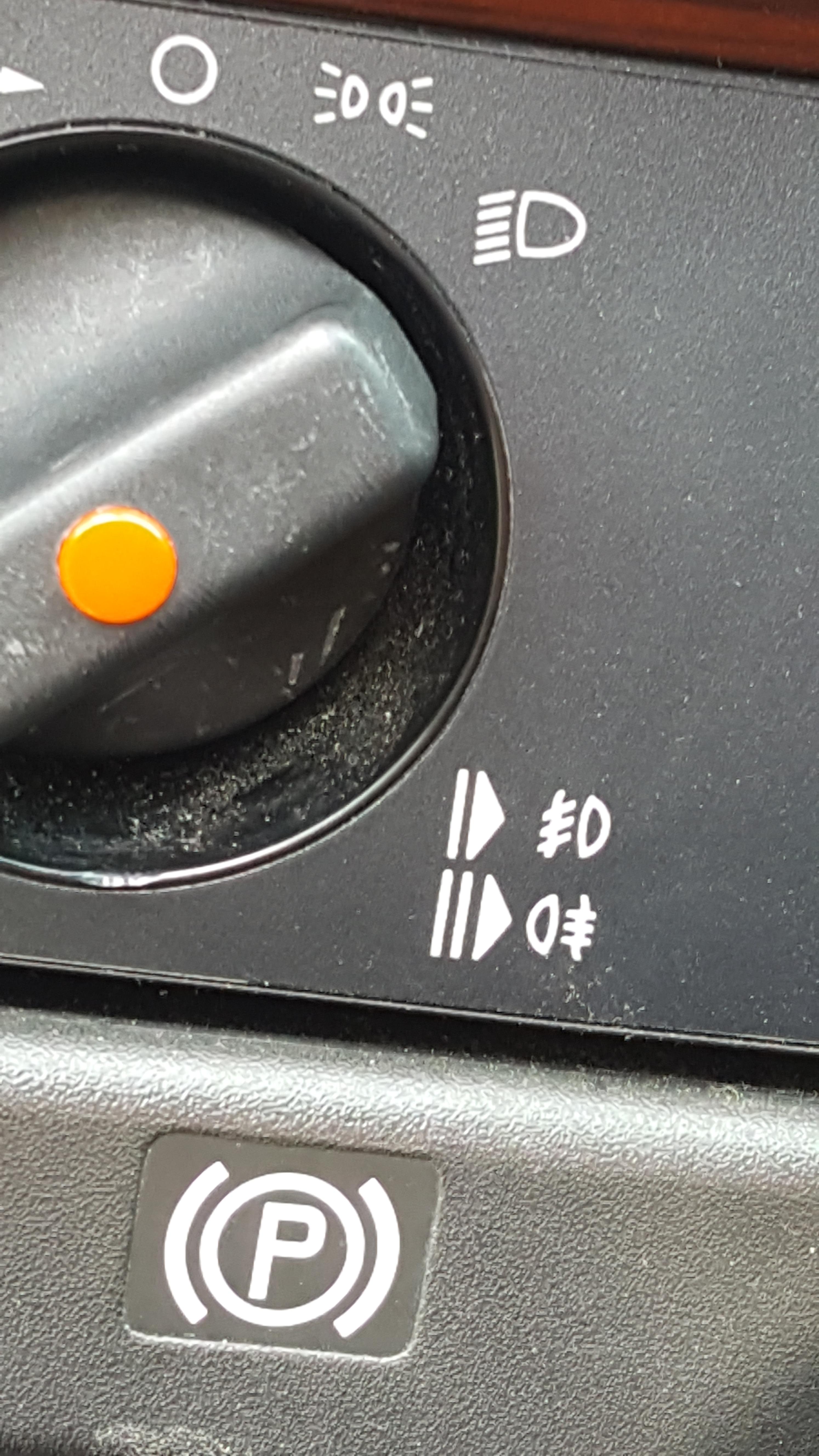 Icons to the right of the light switch. Can anyone tell me what they mean? Thanks. | Scrolller