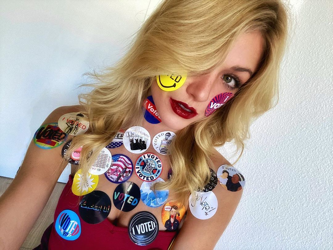 Katherine McNamara covering herself with stickers and acting as a walking ad ? If anything she's ...