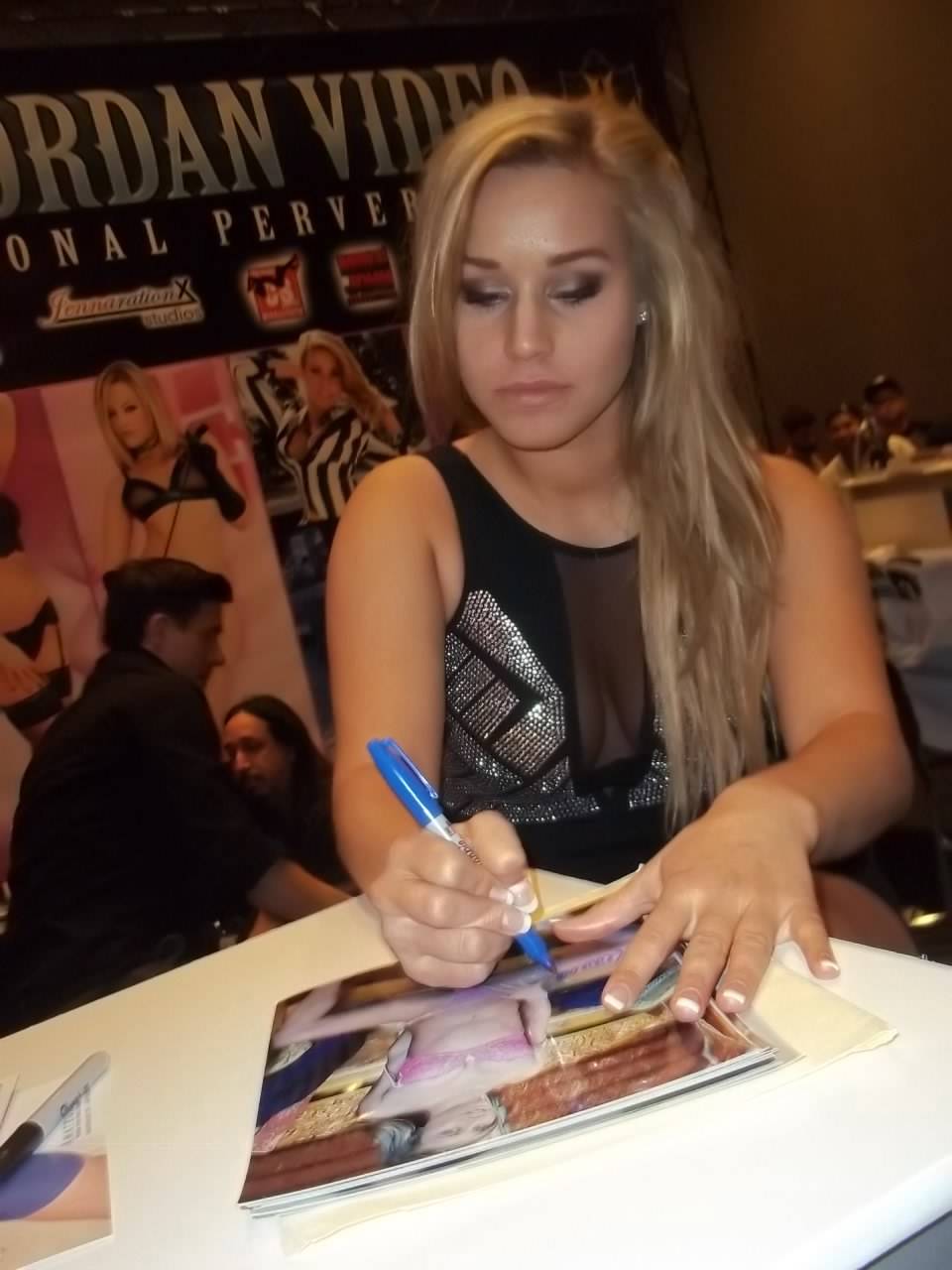 Kennedy signing autographs | Scrolller