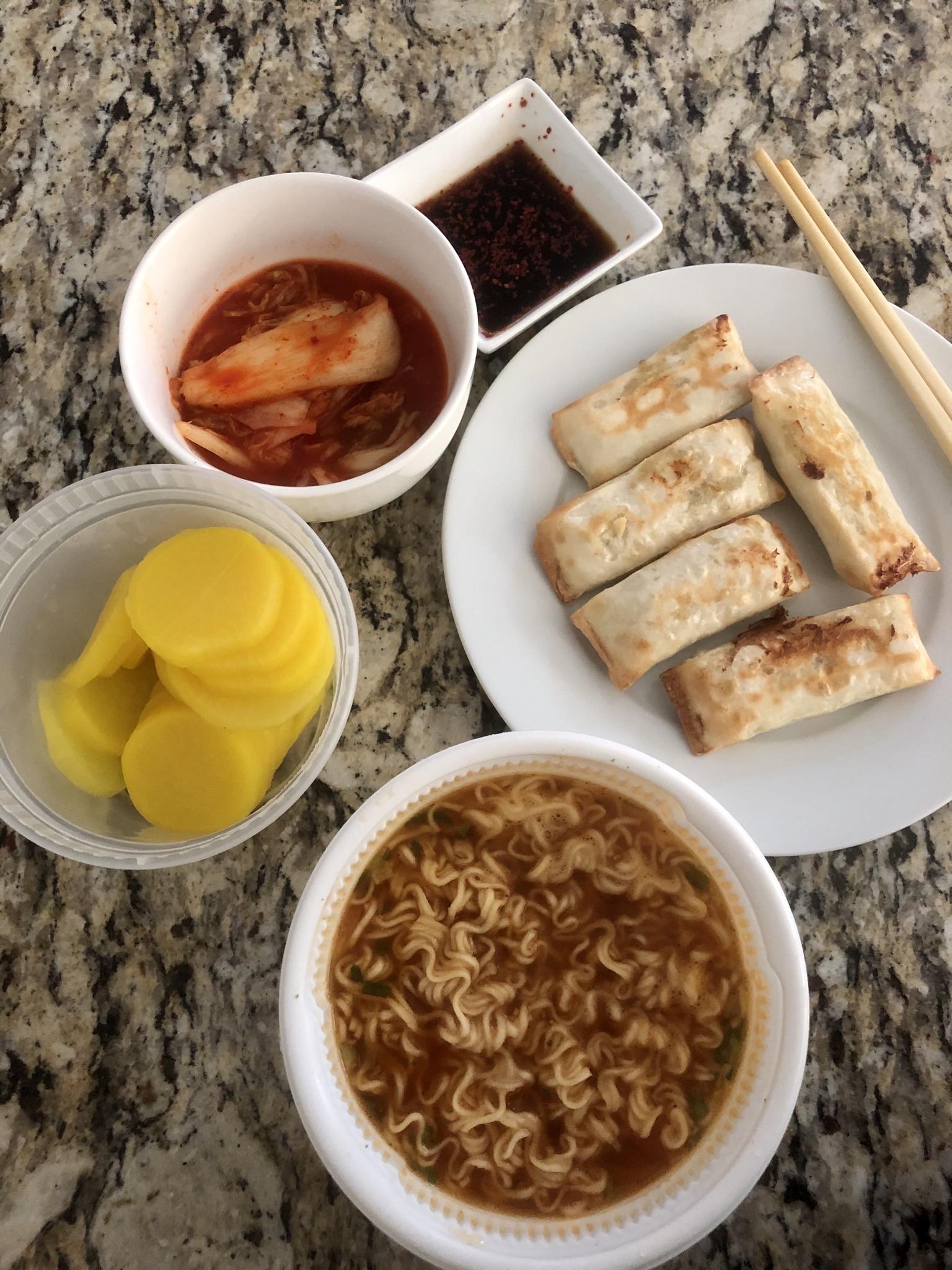 Kimchi ramen, japchae potstickers, daikon slices, and kimchi. Korean comfort junk food! | Scrolller