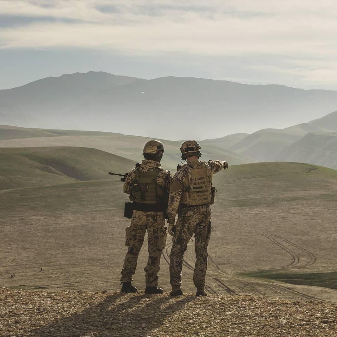 Latvian Army Military police CPT and German Army Military police in joint patrol in Afghanistan ...