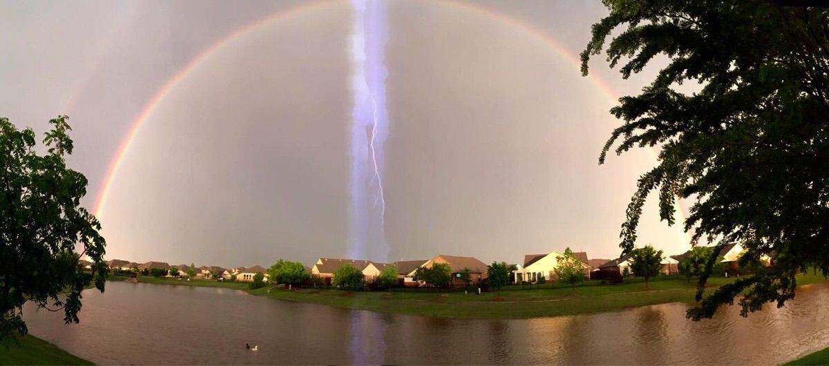 Lightning strikes rainbow | Scrolller