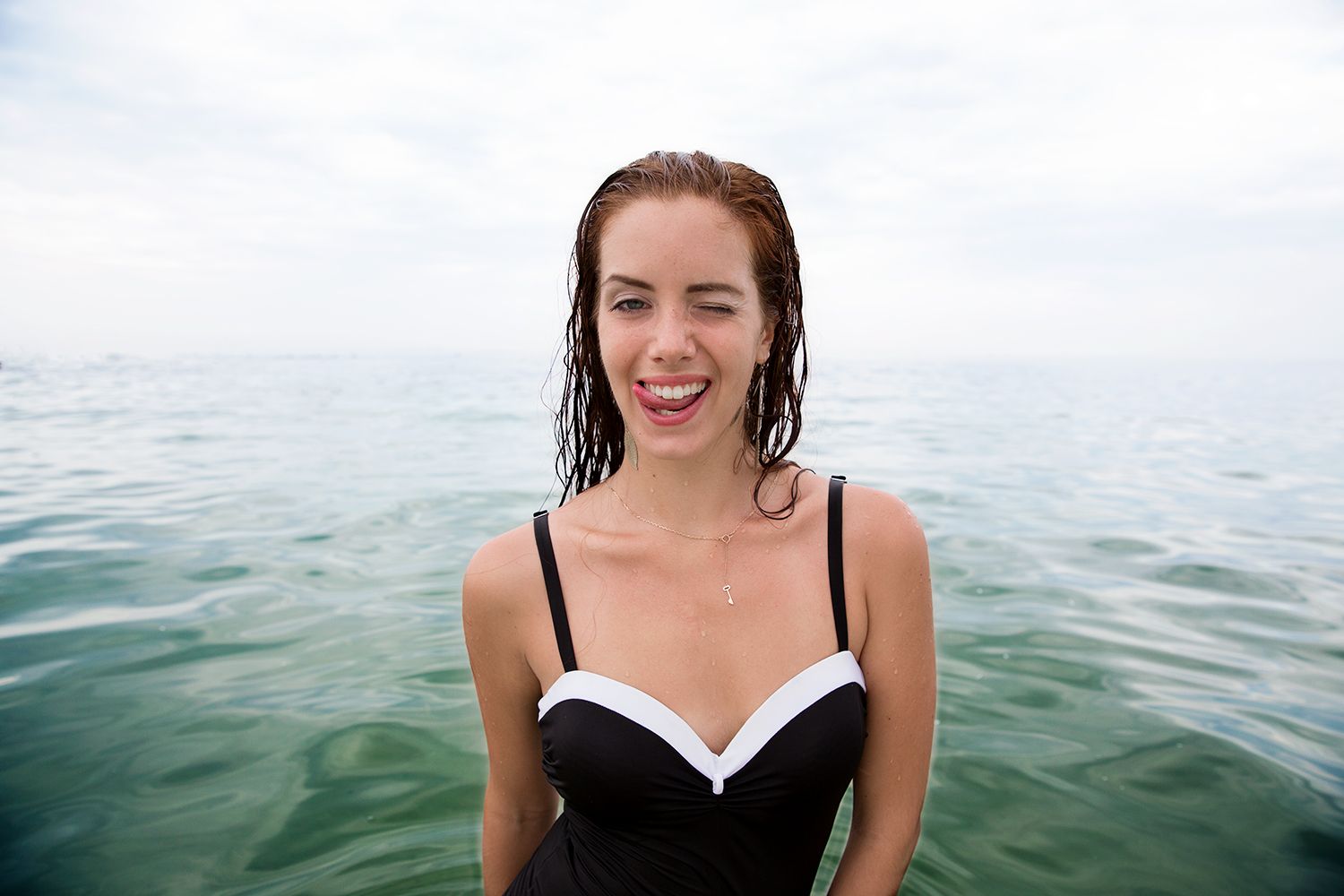 Lip-licking redhead | Scrolller