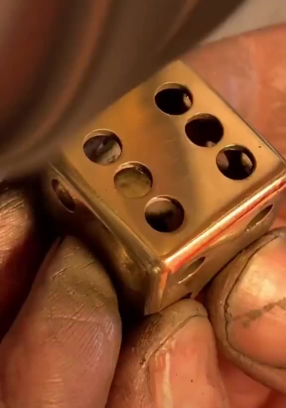 Making brass dice | Scrolller