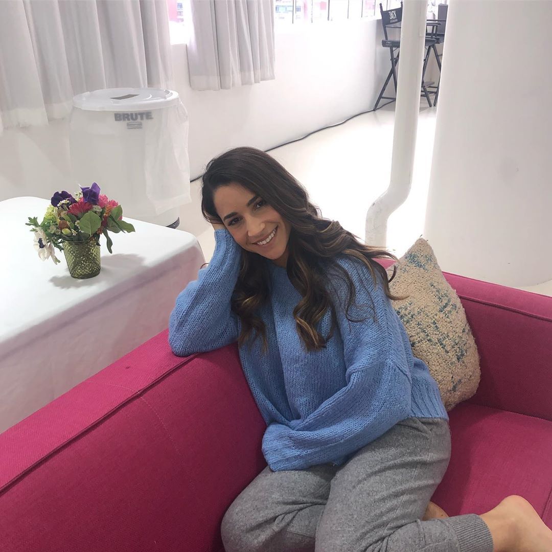 Lounging in her Aerie Sweater | Scrolller
