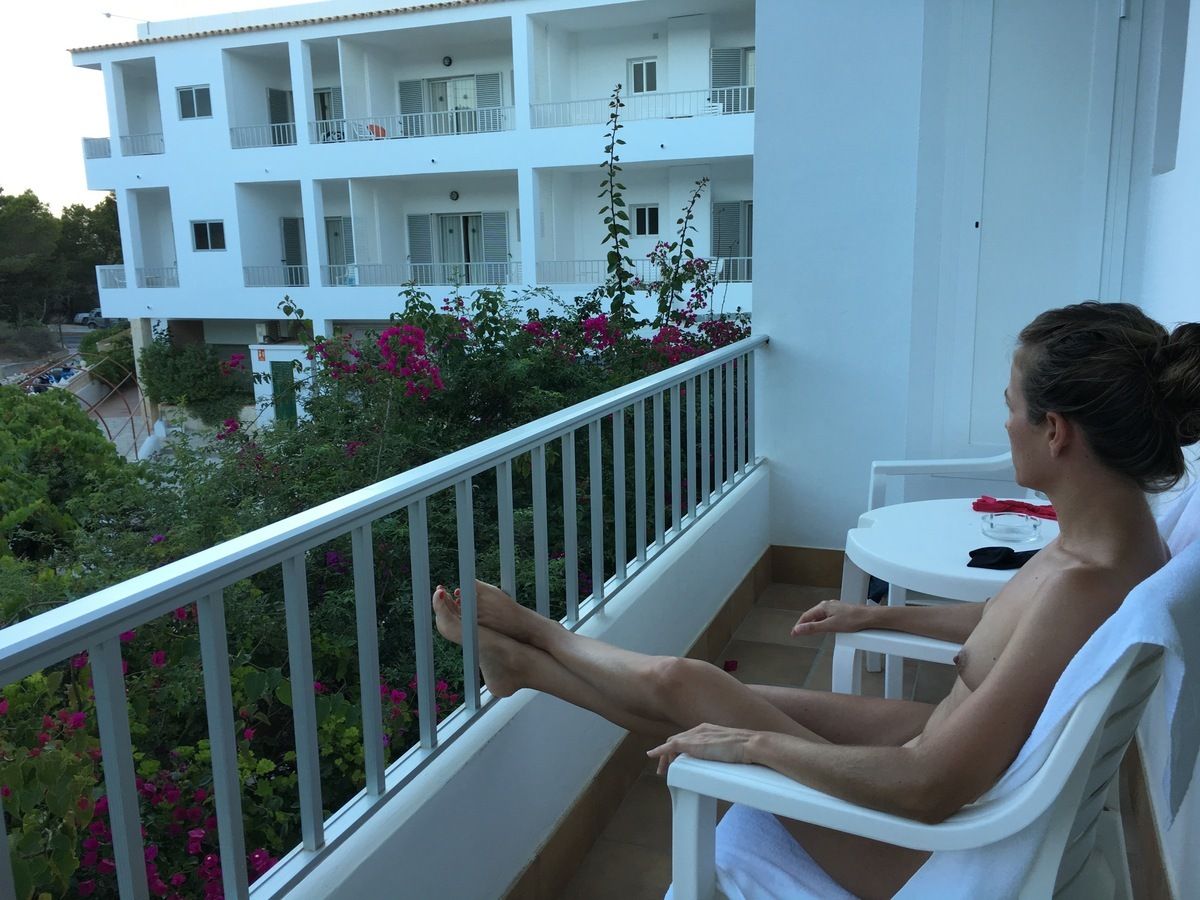 Lounging on the balcony | Scrolller