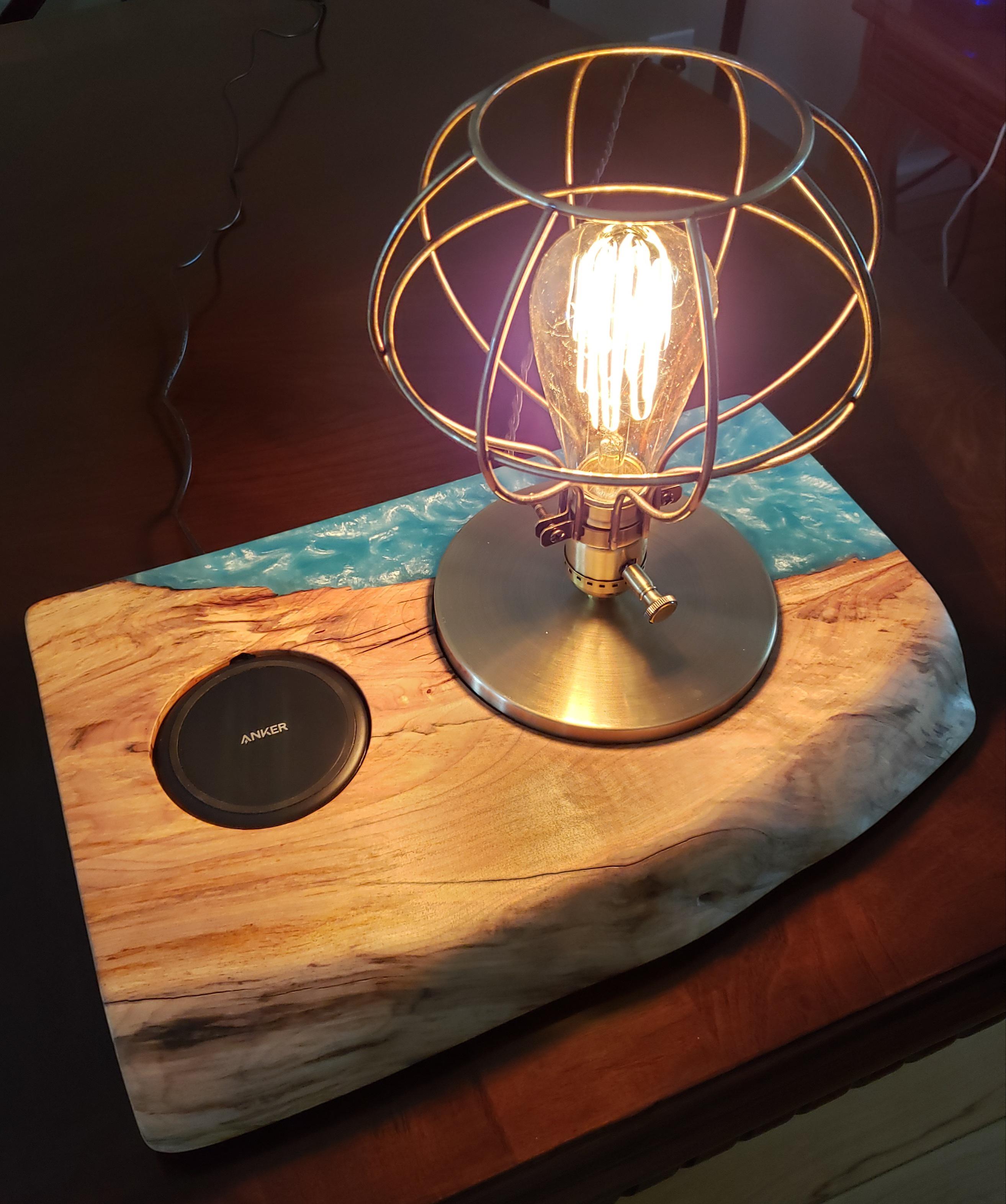 Made a wireless charging station, with a dimmable Edison bulb reading lamp. Maple/epoxy base ...