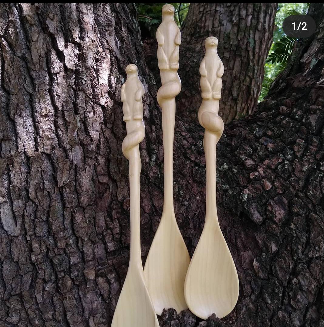 My cousin has been doing a lot of woodworking during Covid and just finished these otter spoons ...