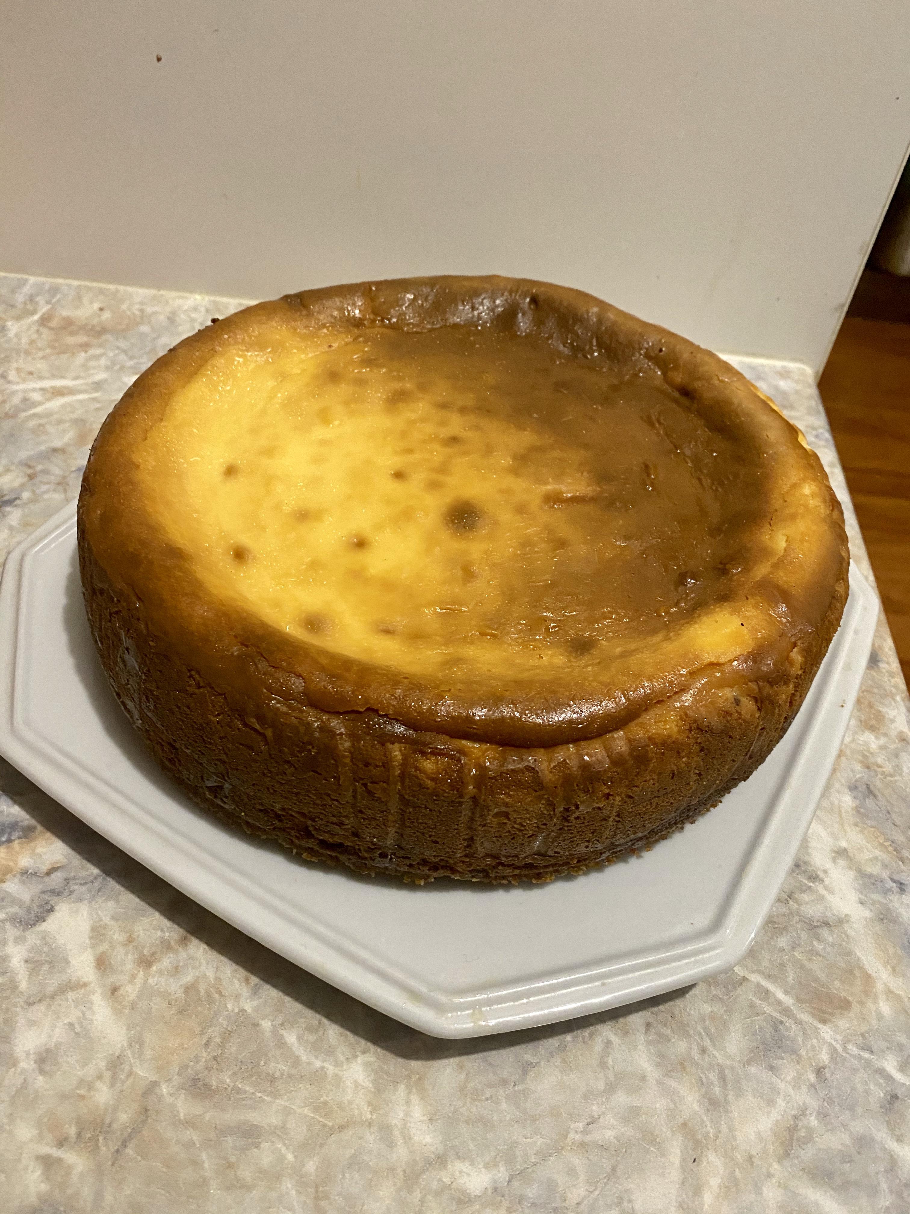 My first attempt at a New York Baked Cheesecake! 4 blocks of cream cheese later and I am one ...