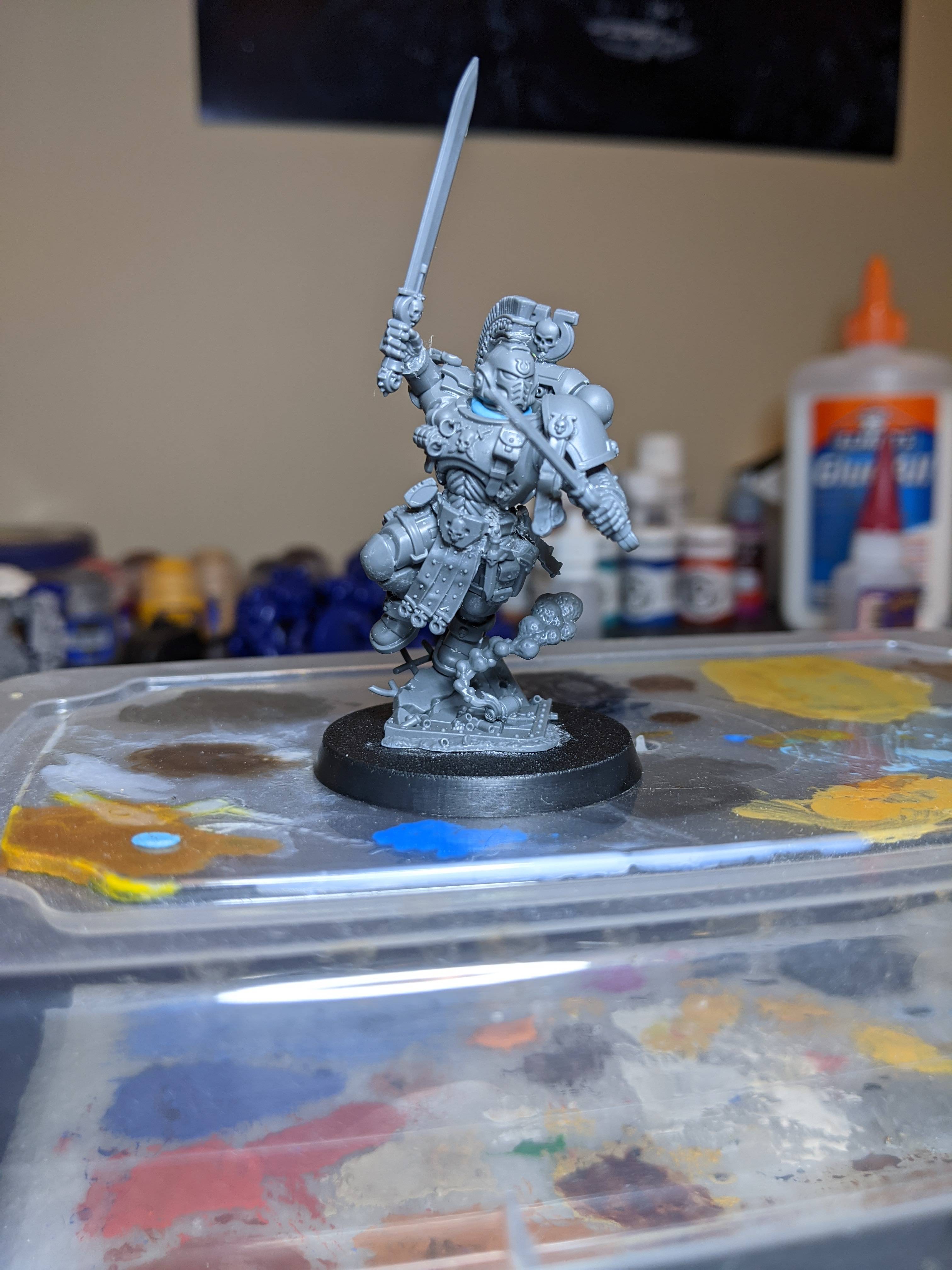 My first attempt to kitbash a primaris chapter champion went horribly. I think this attempt is a ...