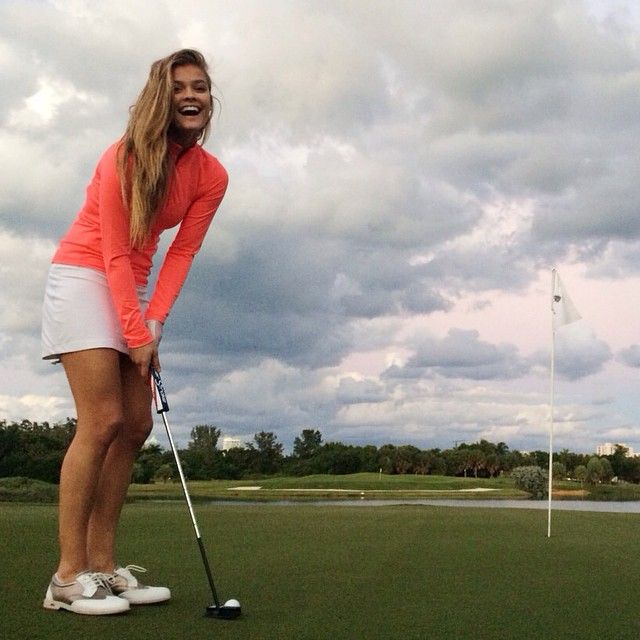 Nina practicing her putting. | Scrolller