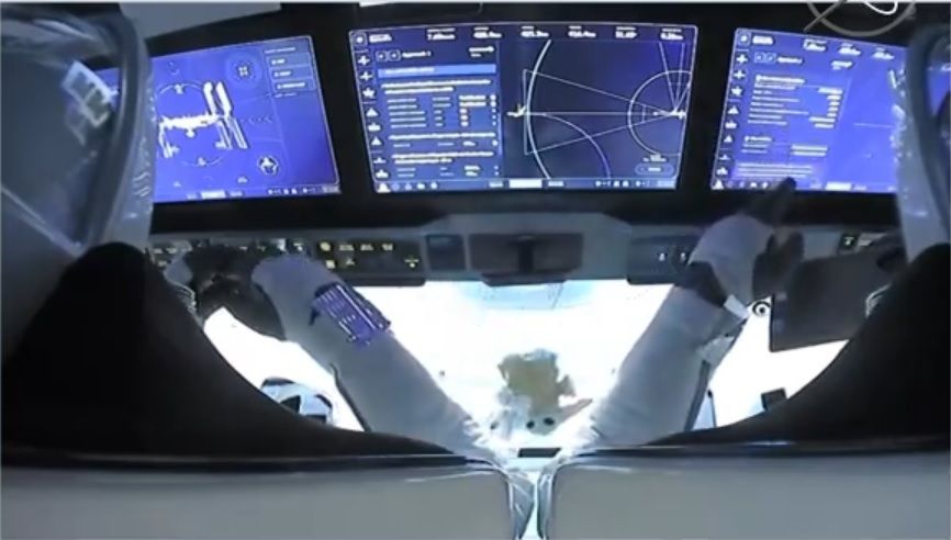 Noticed a little guy at the livestream of the docking of the spaceX shuttle | Scrolller