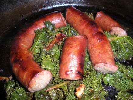 Pan-seared veal sausage with sauteed kale. | Scrolller