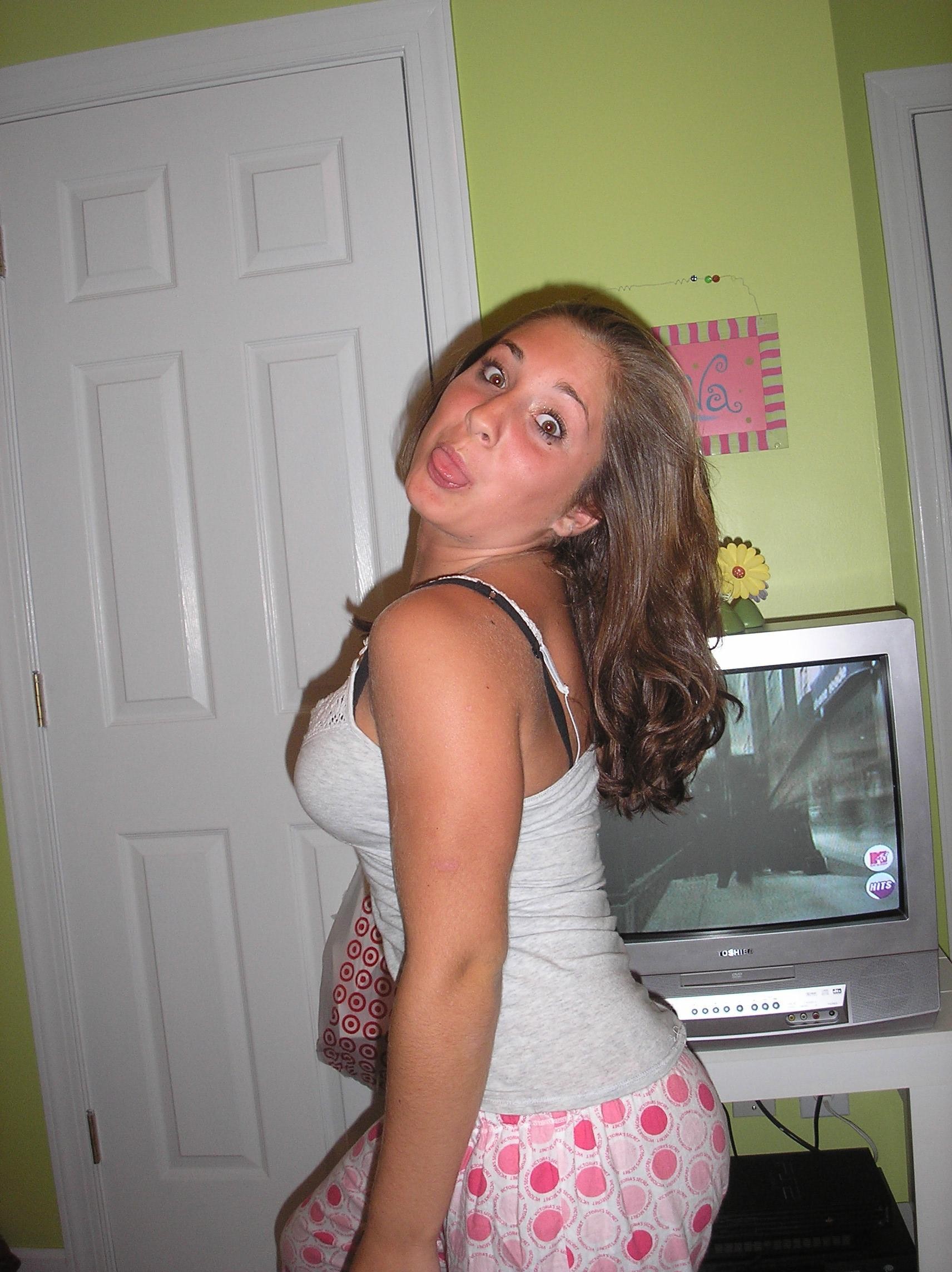 Poking her tongue out | Scrolller