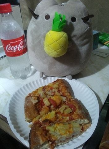 Pusheen decided she wanted some of my noms. | Scrolller