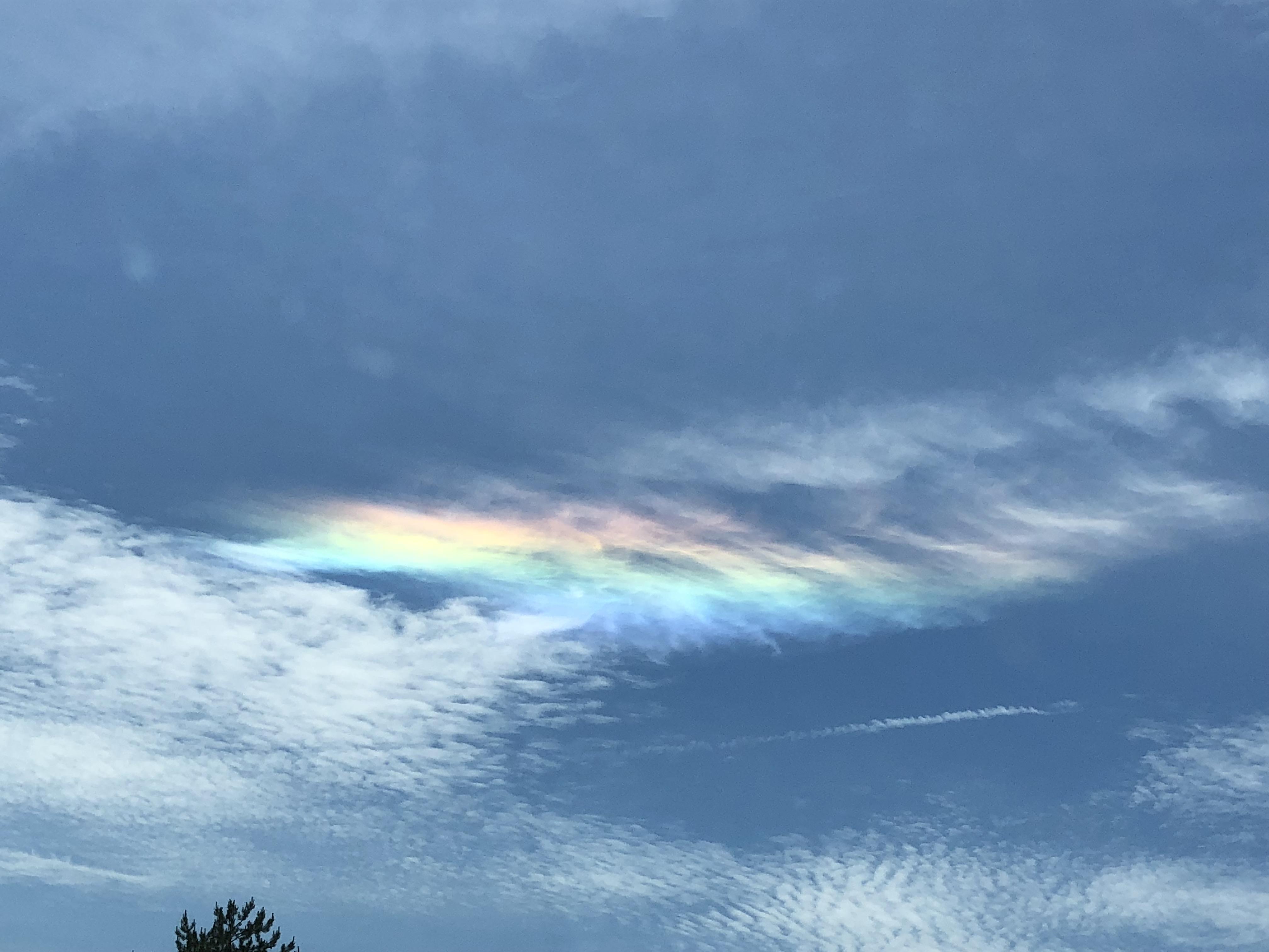 Rainbow in the clouds | Scrolller