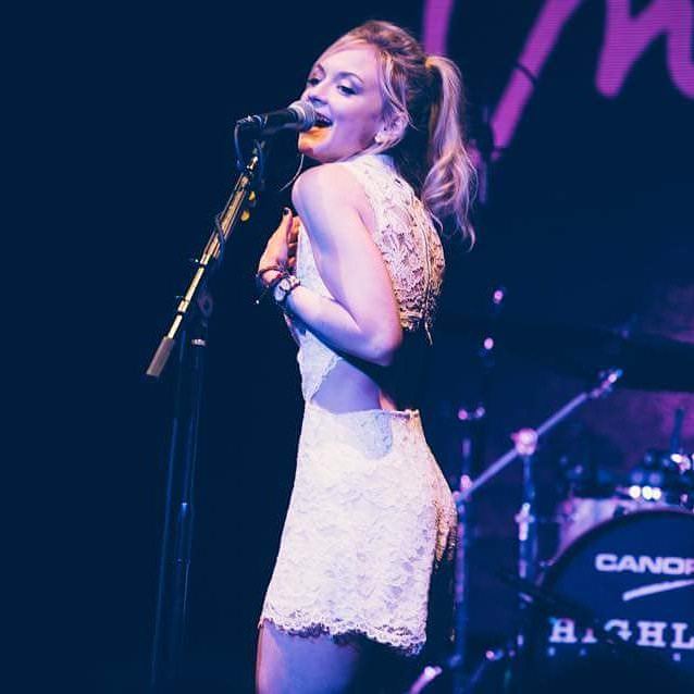 Sexy Emily on stage. | Scrolller