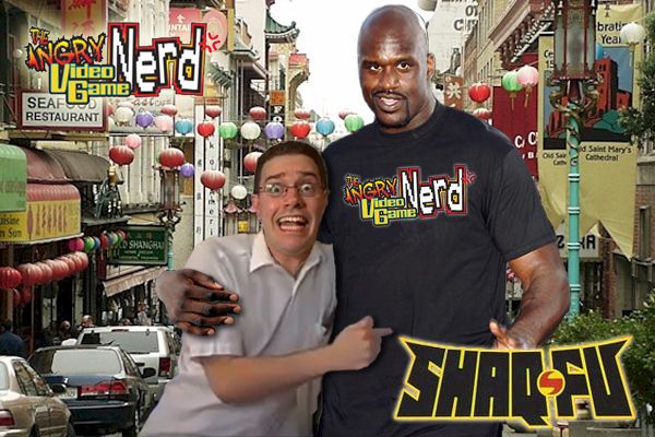 Shaq holding a gaming nerd. | Scrolller